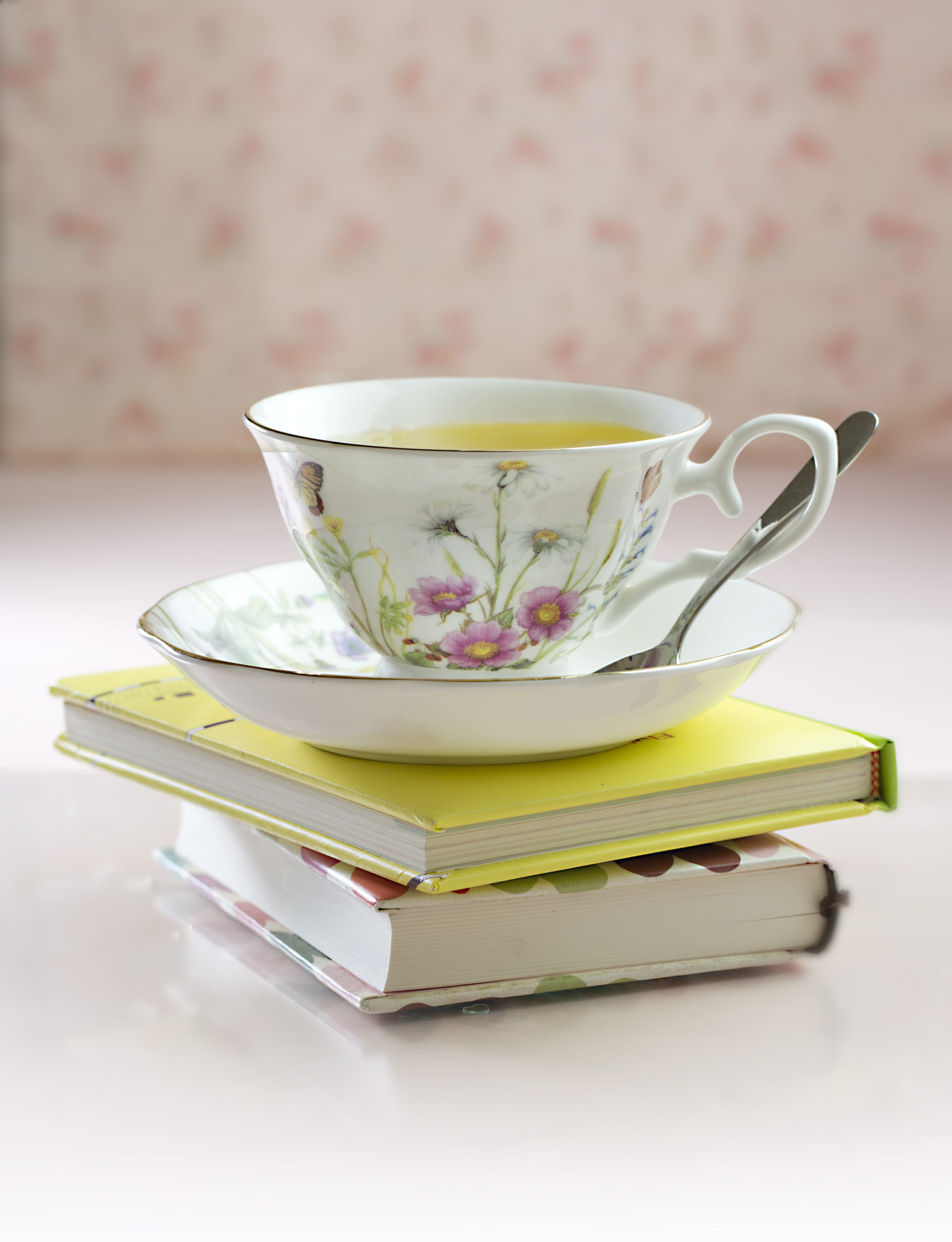 A,Cup,Of,Tea,On,A,Stack,Of,Books,On - Think Gin Club™